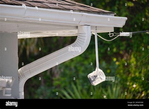 Motion Sensor With Light Detector Mounted On Exterior Wall Of Private House As Part Of Security