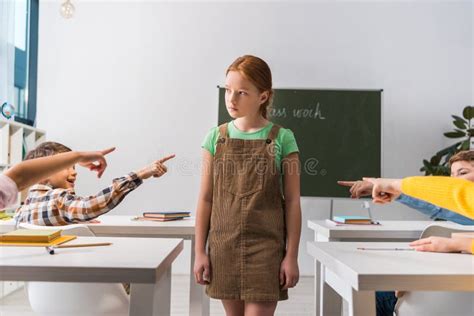 Cruel Classmates Pointing With Fingers At Stock Photo Image Of Bullying Classmates 175033176