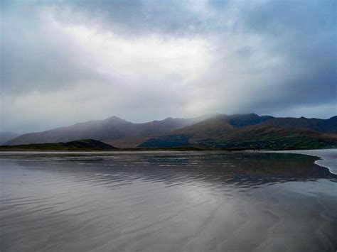 The Man In The Sand In The Shadow Of Mount Brandon Travel To Thin