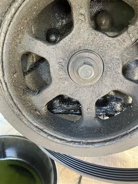 Overheating and leaking coolant from above oil pan, what can I get checked and replaced to fix ...