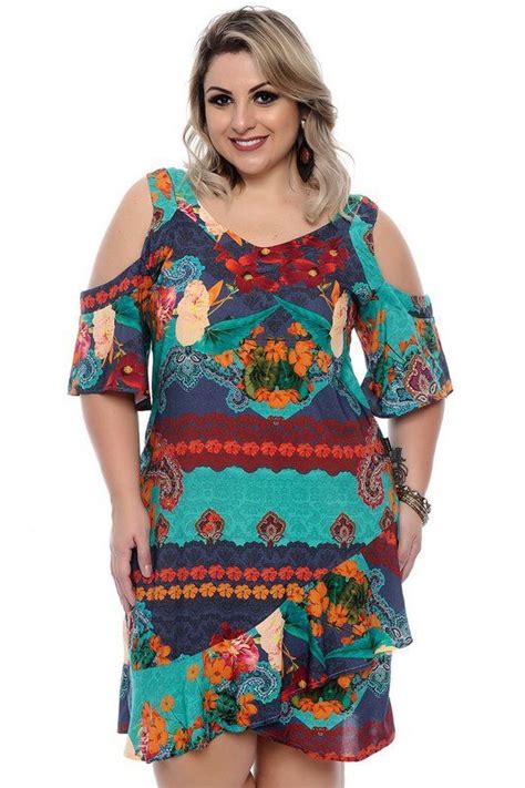 Vestido confeccionado em viscose estilo ciganinha possui alça manga