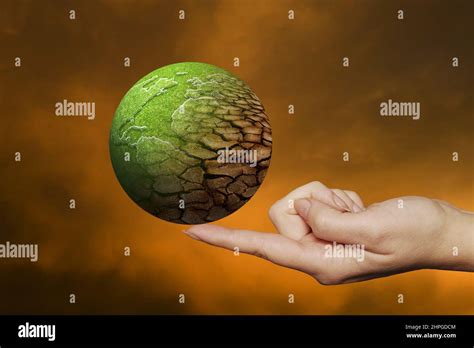 Finmger Holding A Earth Globe Partially Dried Global Warming Concept Stock Photo Alamy