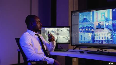 Security Officer Monitoring Surveillance Cameras In Control Room Stock Footage Video Of Camera