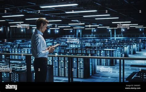 Data Center Engineer Using Digital Tablet Computer Maintenance Specialist High Tech