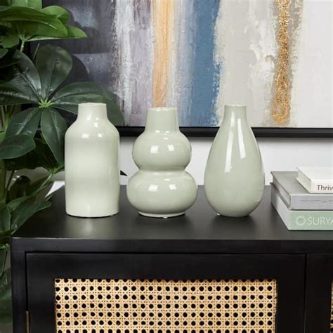 Litton Lane Green Minimalistic Rounded Ceramic Decorative Vase With Varying Shapes Set Of 3