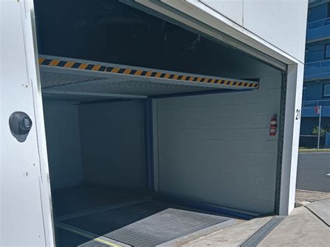 Powerup Engineering Double Wide Pit Type Car Stacker