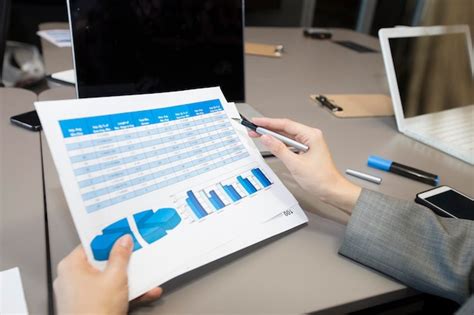 Premium Photo Businessman Analyzing Graphs