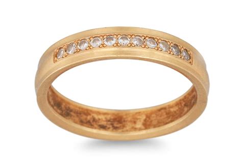 Lot 137 A Diamond Half Eternity Ring Mounted In
