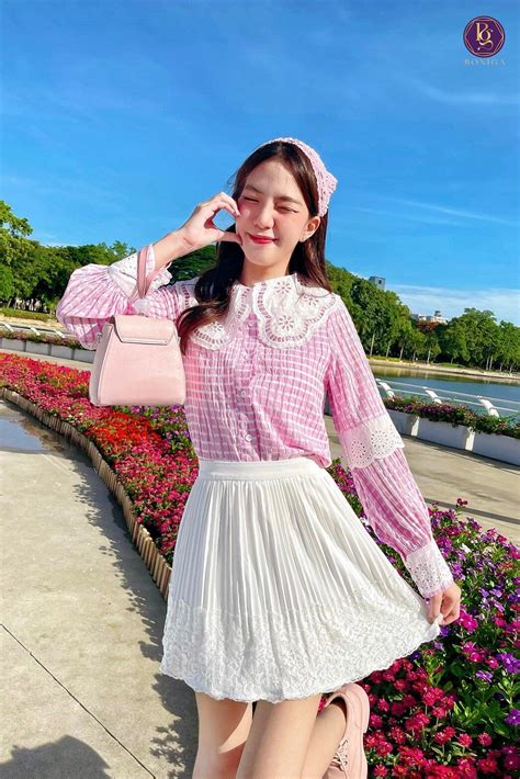 Preppy Scotty Set เซ็ต 2 ชิ้น เสื้อเเขนยาวลายสก็อตสีชมพู กระโปรงสั้นสี