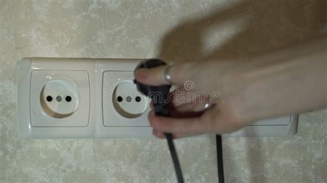 various plugs of electrical appliances are inserted connected sockets