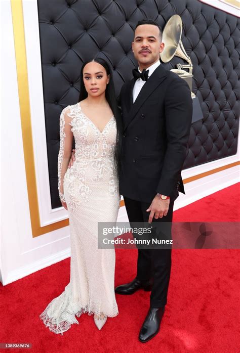 Kristy Sarah Scott And Desmond Scott Attend The 64th Annual Grammy