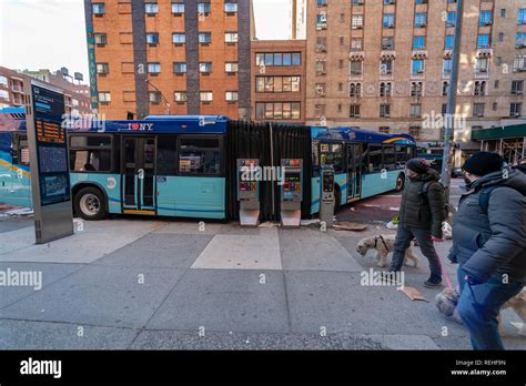 An Mta Articulated Bus Part Of The Select Bus Service Route Is Wedged