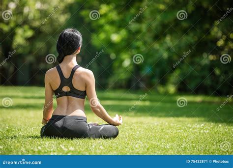 Girl Practicing Yoga Outdoors Stock Image Image Of Lotus Position