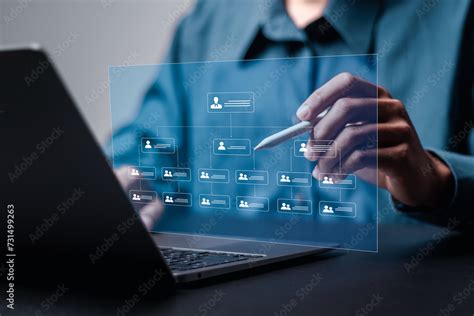 Businessman Use Laptop With Business Hierarchy Structure For Business Process And Workflow