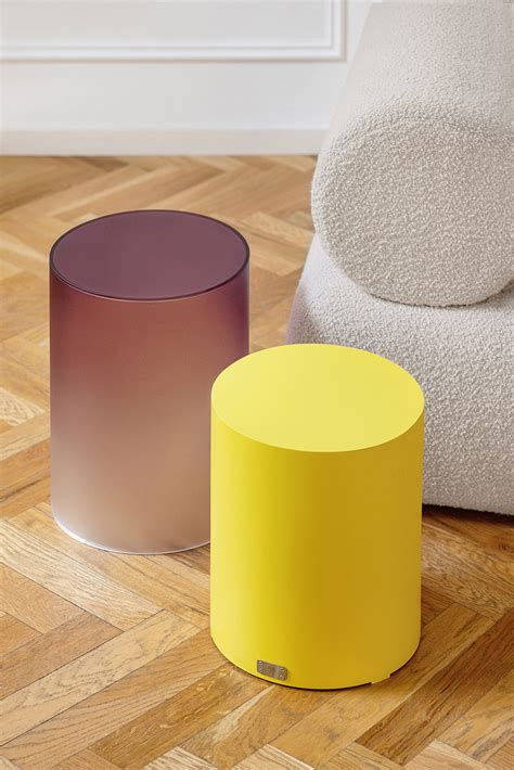 Nesting tables by Mikolášková Drobná change colour as they re combined