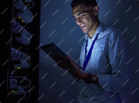 Premium Photo Man Engineering And Tablet In Data Center Or Server