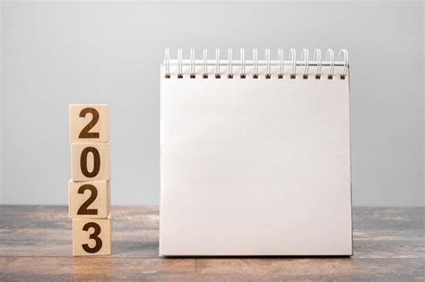 Premium Photo Mockup 2023 Calendar Text 2023 On Wooden Cubes Space
