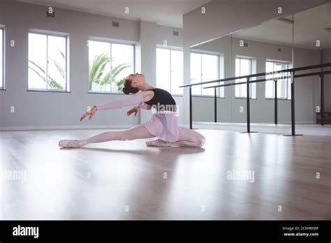 Female Ballet Dancer Stretching At Ballet Class Stock Photo Alamy