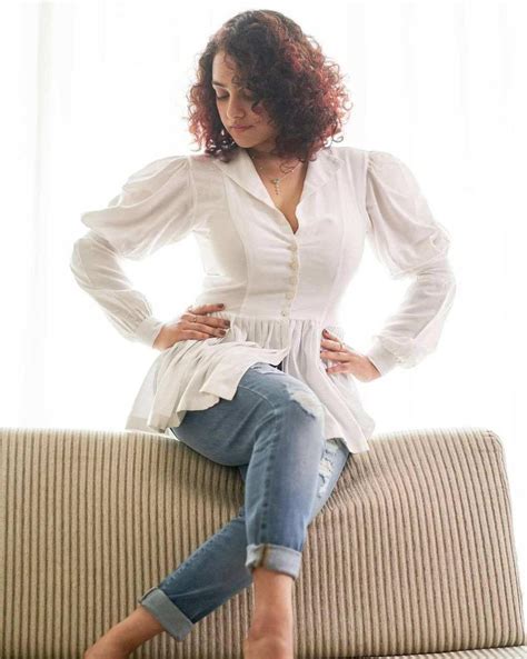 Nithya Menen Looks Fierce In Long White Top And A Pair Of Distressed Denim