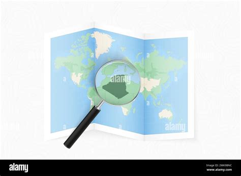 Enlarge Algeria With A Magnifying Glass On A Folded Map Of The World Vector Paper Map Stock