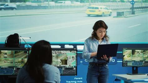 Premium Photo Young Manager Analyzing Traffic Surveillance Data With