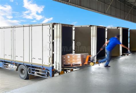 Workers Loading Pallets Of Goods From A Truck Container Supplies Shipment Freight Truck