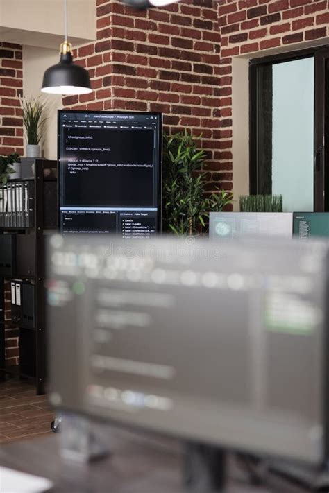 interior of empty data center office with multiple computer screens