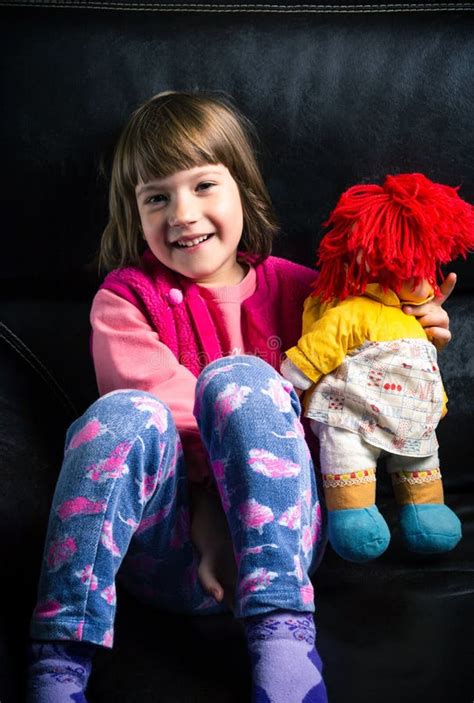 Cute Girl With Her Toy On The Sofa Stock Image Image Of Holding Casual