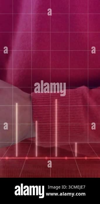 Animation Of Graph On Grid Pattern Over Midsection Of Man Standing And