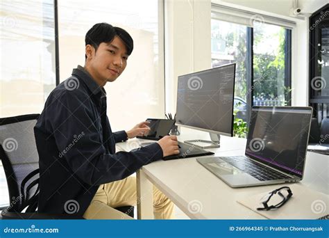 It Specialist Man Checking Debugging System On Large Curved Monitor Working In Startup Company