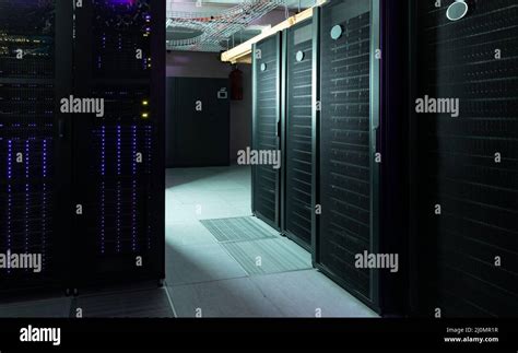 Data Center With Multiple Rows Of Fully Operational Server Racks Stock