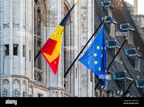 Belgian And European Flag At The Town Hall Brussels Grand Place