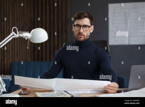 Architect Working In Office With Blueprintsengineer Inspect Architectural Plan Sketching A