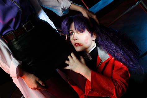 Download Ritsuko Akagi Posing In Her Trademark Office Attire Wallpaper