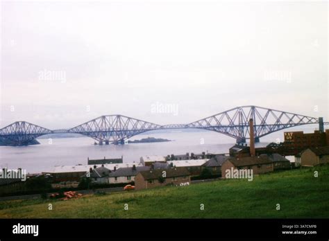 A 1970s View Of The Iconic Forth Bridge Spanning The Firth Of Forth In