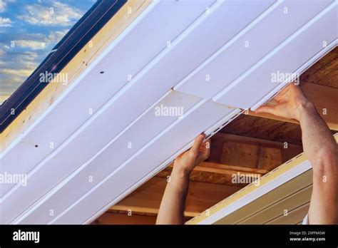 Installation Of Vinyl Soffit Plastic Boards On Ceiling New Home Stock