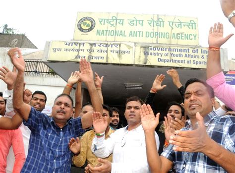 Supporters Of Narsingh Pancham Yadav Demonstrate Outside Nada Office