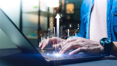 Close Up Of Hands Typing On A Laptop Keyboard With Futuristic Financial