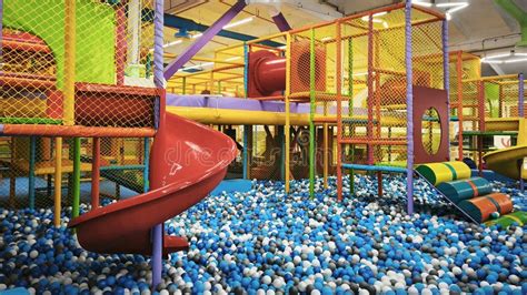Colorful Indoor Playground With Slides Climbing Structures And A Ball