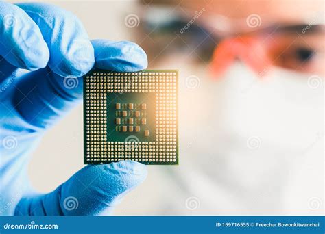 The Technician Looking To The CPU For Analyzing In The Lab The Concept Of Computer Service