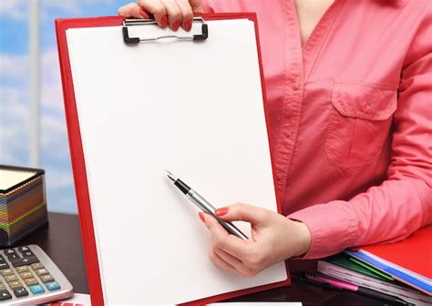 Premium Photo Woman Showing Clipboard