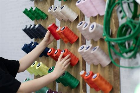 Premium Photo Collection Of Colorful Thread Rolls On Sewing Manufacture