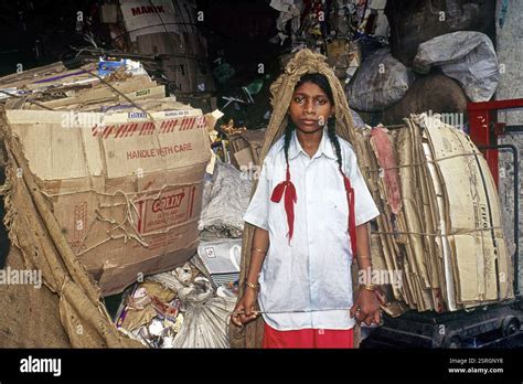 Rag Picker Girl With Garbage Collection Bag On Shoulder Mumbai Maharashtra India Asia Stock