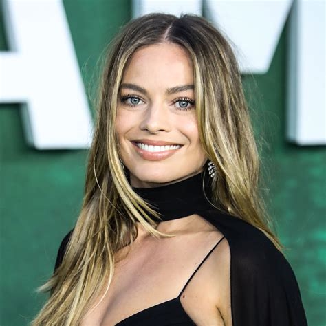 Margot Robbie Leaves Us Speechless In A Black Minidress And Sheer