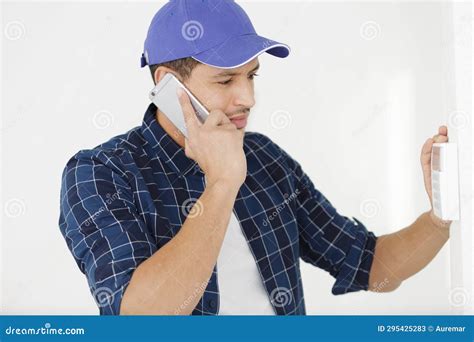 Man Installing Electrical Device On Wall Stock Image Image Of Technician Background 295425283