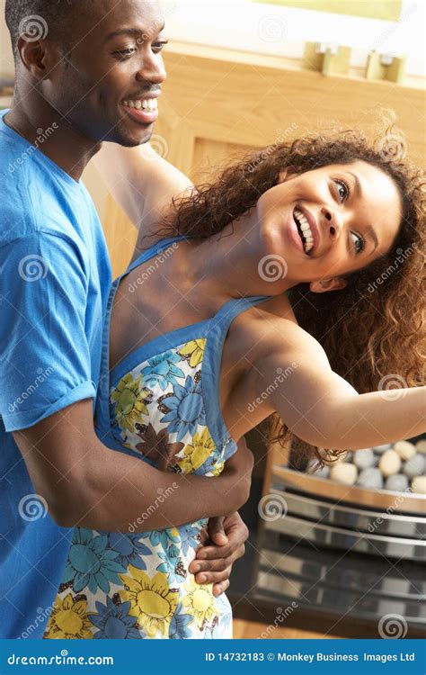 Young Couple Dancing Together In Living Room Stock Image Image Of
