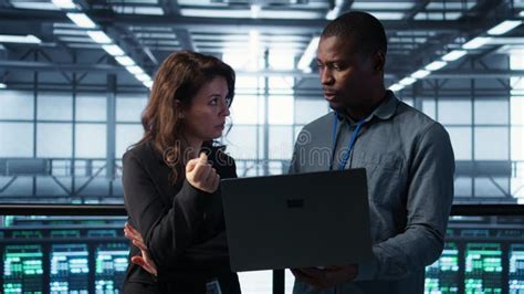 Engineers Using Laptop In Data Center Managing Server Virtualization Stock Video Video Of