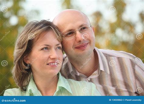 Couple In Early Fall Park They Are Cuddling Stock Image Image Of