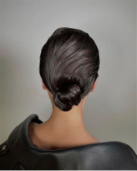 A Twist On The Classic Bun Hairstyles For Layered Hair Curly Hair