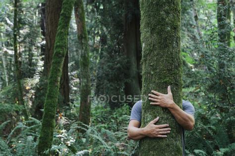 Man Hugging Tree Game Piece Nature Stock Photo 124355042